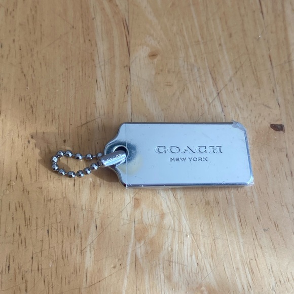 Coach | Accessories | Coach New Silver Metal Hang Tag Says Coach On Tag ...